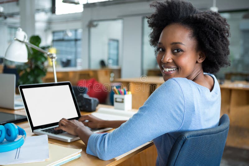 Female Graphic Designer Using Laptop in Creative Office Stock Image ...