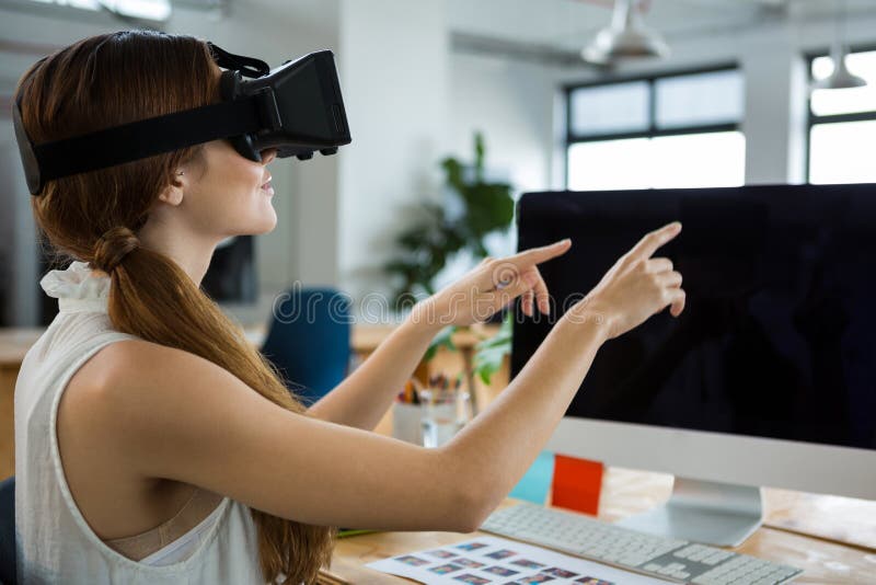 Female Graphic Designer Using the Virtual Reality Headset Stock Image ...