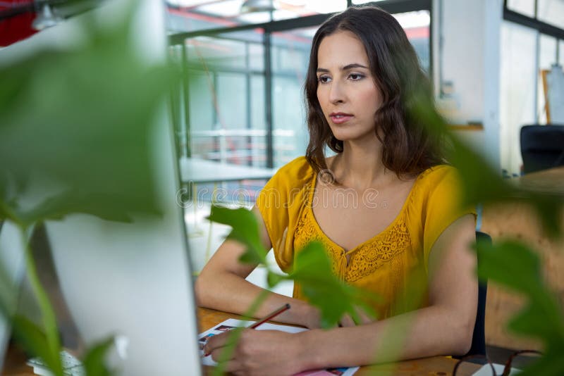 Female Graphic Designer Working on Computer Stock Photo - Image of ...