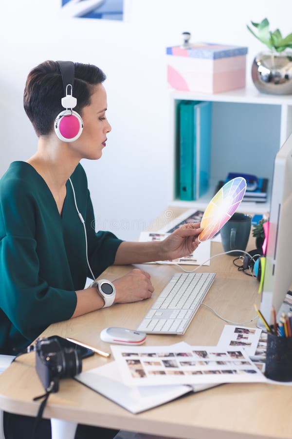 Female Graphic Designer Working on Computer at Desk Stock Photo - Image ...