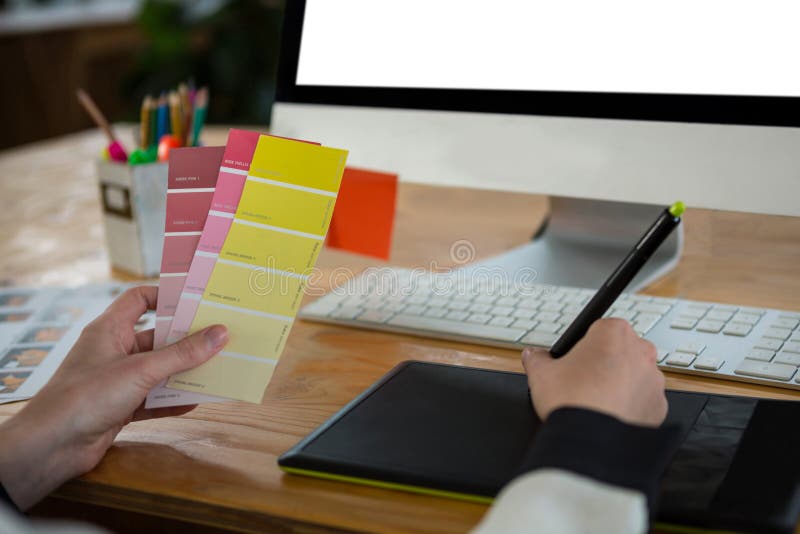 Female Graphic Designer Working at Desk Stock Image - Image of ...