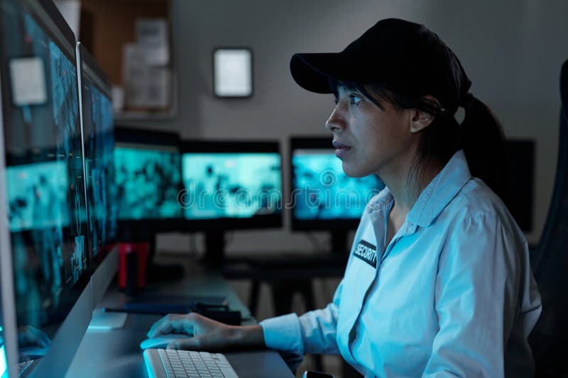 Female Guard Working in Control Room Stock Image - Image of occupation ...