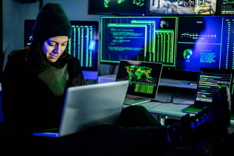Female Hacker Breaking into Corporate Network Using Laptop and Multiple Screens Stock Image ...