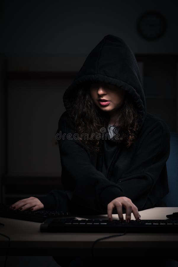 Female Hacker Hacking Security Firewall Late in Office Stock Photo ...