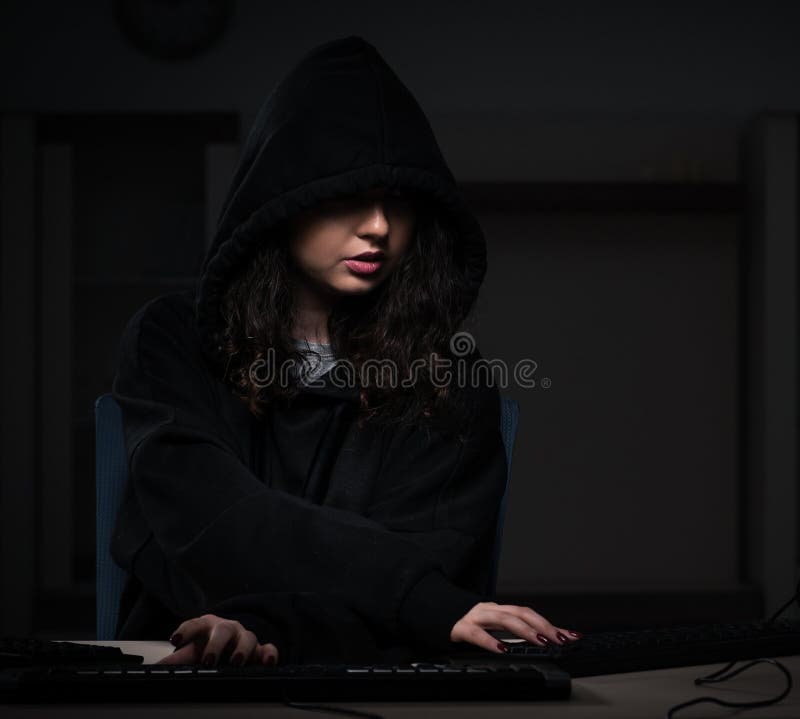 Female Hacker Hacking Security Firewall Late in Office Stock Photo ...