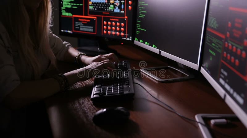 Female Hacker Working on a Computer, Coding at Night. Stock Video ...