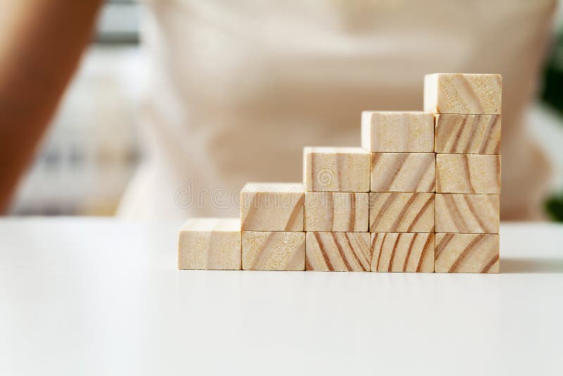 Female Hand Arranging Wood Block Stacking As Step Stair Stock Photo ...