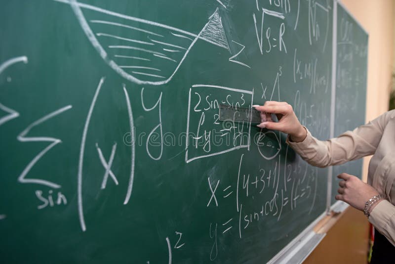 Female Hand with Chalk and Write Math Formula on Blackboard Stock Image ...