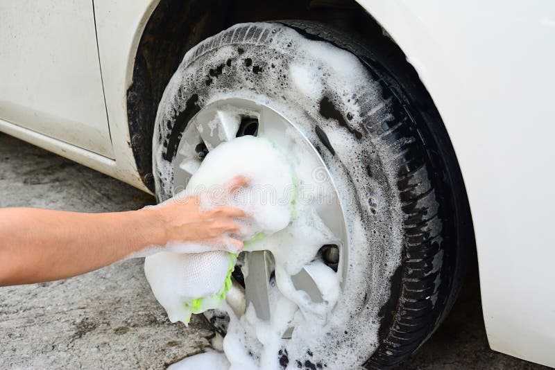 Female Hand is Cleaning Car Tire Stock Image - Image of unclean, tire ...