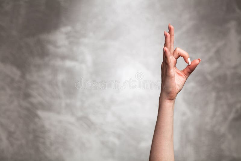 Female Hand on Dark Background Stock Photo - Image of hand, grey: 114129726