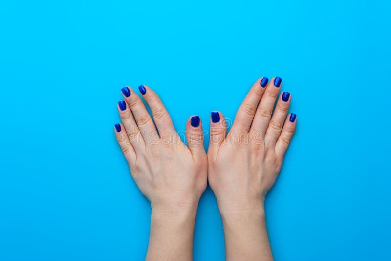 Female Hand with Dark Blue Nails Showing Gesture Stock Photo - Image of ...