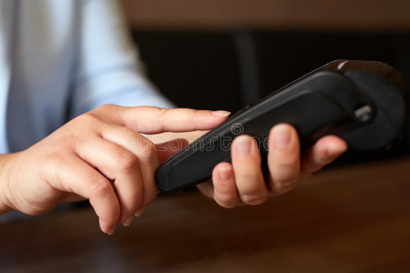 Female Hand Entering PIN Number Using Payment Terminal Stock Image ...