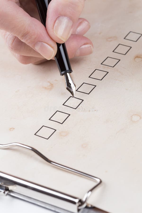 Female Hand Fills a Document Attached To the Clipboard Stock Image ...