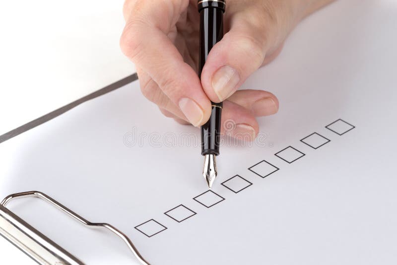 Female Hand Fills a Document Attached To the Clipboard Stock Image ...