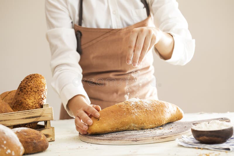 Female Hand Freshly Baked Bread Stock Photo - Image of kitchen, bake ...