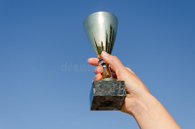 Female Hand Hold Award Cup Blue Sky Background Stock Photos - Free ...