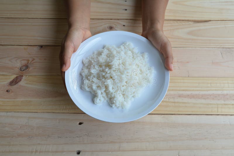 Female Hand Hold Rice in White Bowl Stock Photo - Image of bowl, hold ...