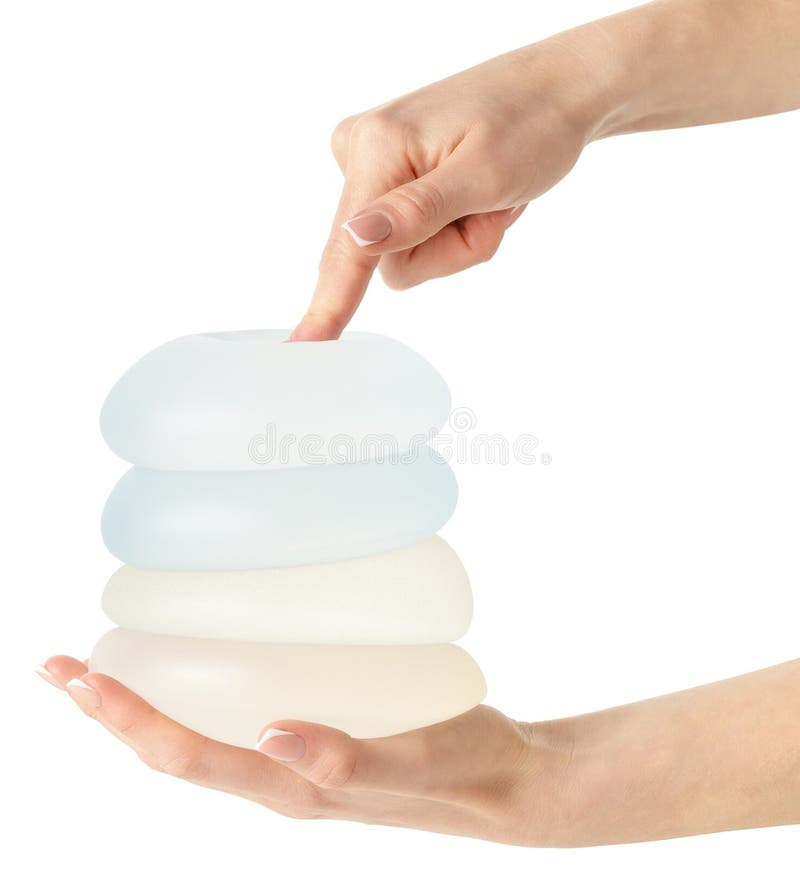 Different Types of Breast Implants in Hand on White Background ...