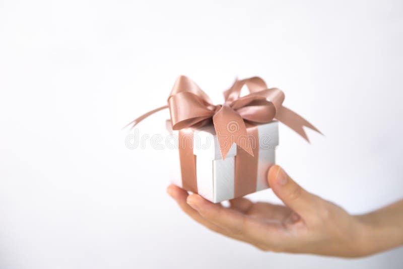 A Female Hand Holding or Giving a Gift Box Stock Image - Image of ...