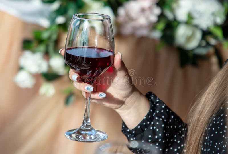 Female Hand Holding a Glass of Red Wine Stock Photo - Image of meat ...