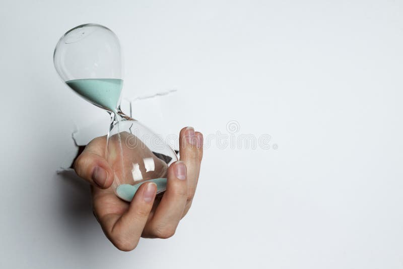 Woman Holding Sand Timer Stock Images - Download 275 Royalty Free Photos