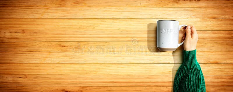 Female Hand Holding a Mug Overhead View Stock Photo - Image of holding ...