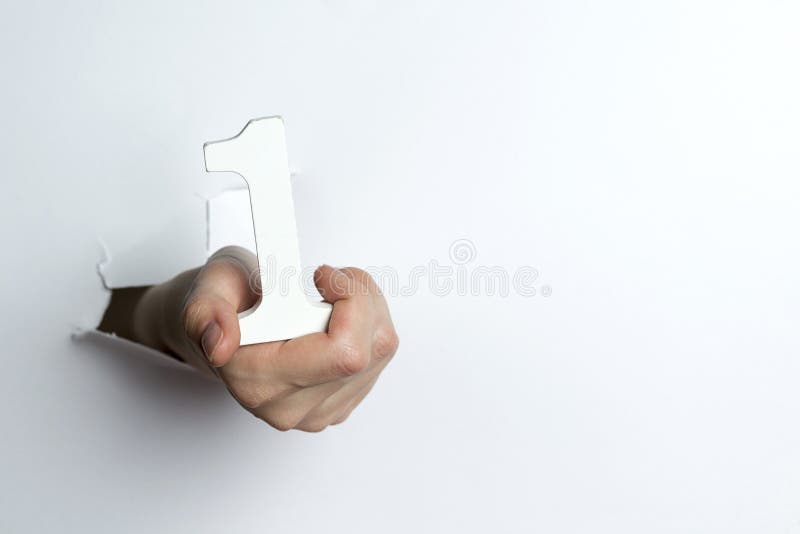 Female Hand Holding a Number One White Background. Stock Image - Image ...