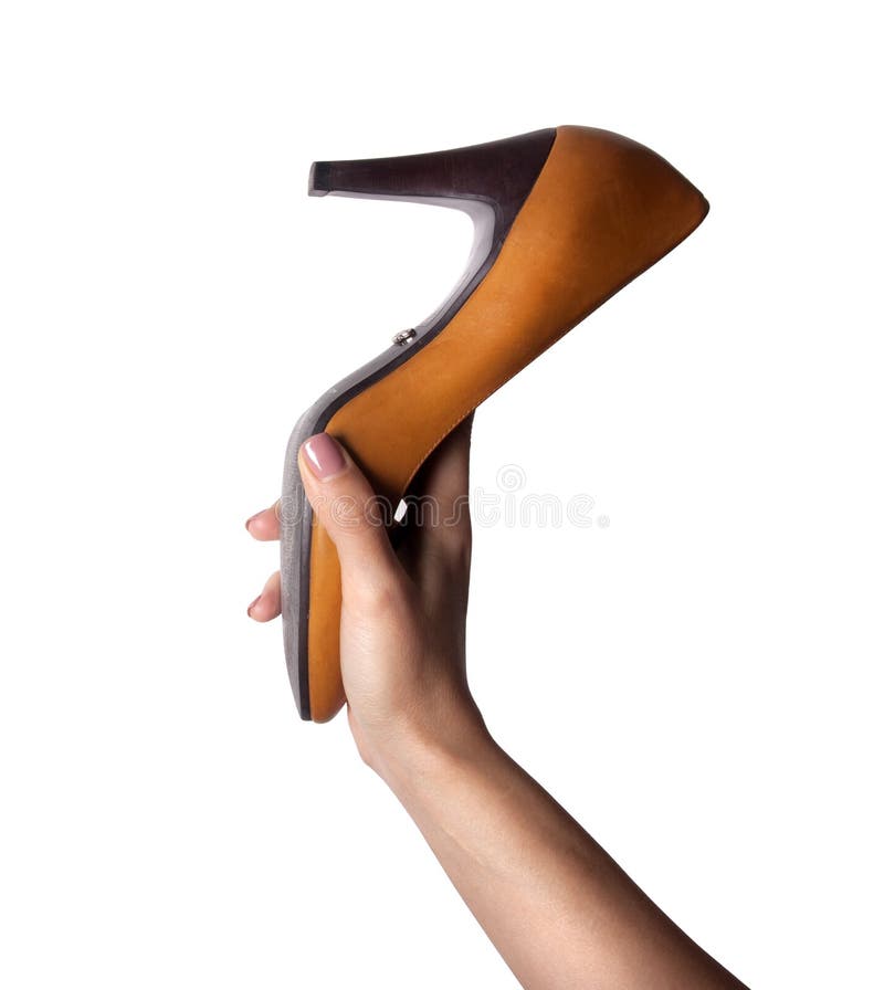Female Hand Holding Orange Shoe Stock Photo - Image of orange, luxury ...