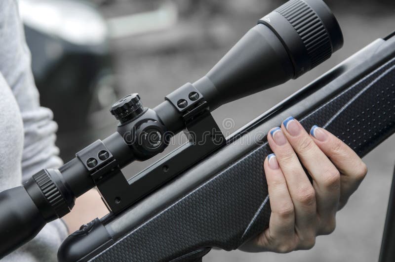 Female Hand Holding a Rifle Stock Image - Image of aimed, protection ...