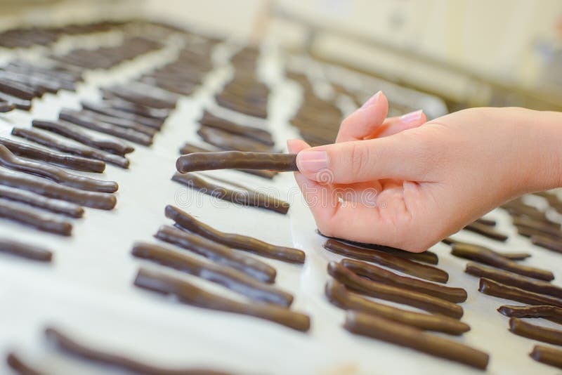 Female Hand Holding Stick Chocolate Stock Image - Image of woman ...