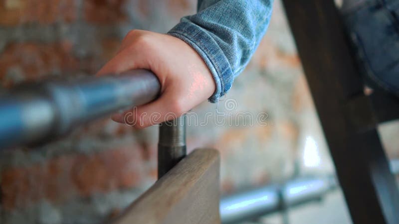 A Female Hand is Holding on To the Railing Stock Footage - Video of ...