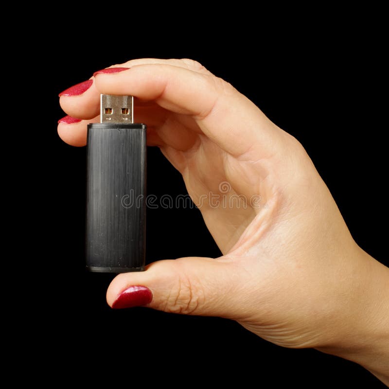 Female Hand Holding USB Flash Isolated on the Black Background Stock ...