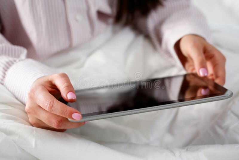 Female Hand Holds Tablet in Home Setting while Stock Image - Image of ...