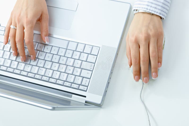 Female hand with laptop stock image. Image of mouse, close - 10087609