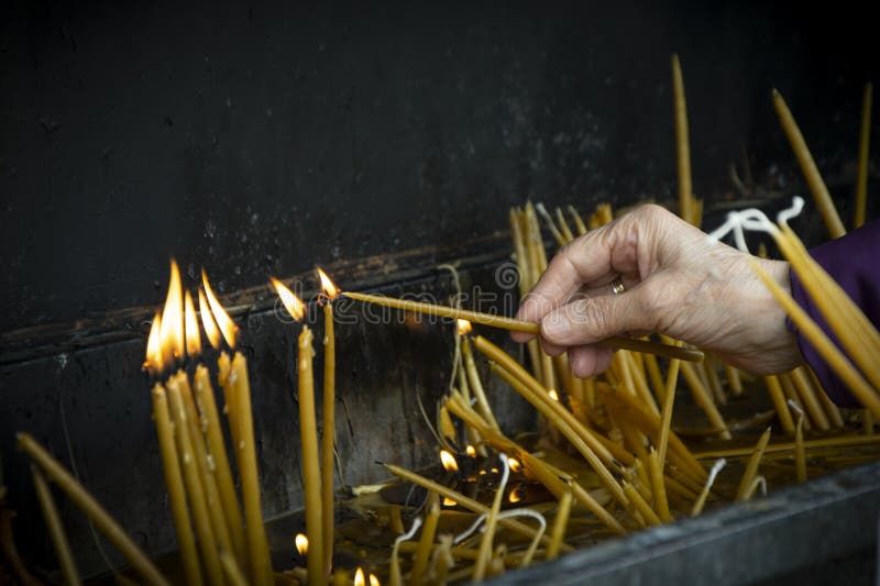 Female Hand Lighting a Prayer Candle Stock Photo - Image of religija ...