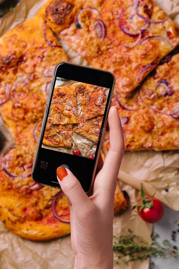 Hand Making a Photo of Pizza with a Mobile Phone Stock Image - Image of ...