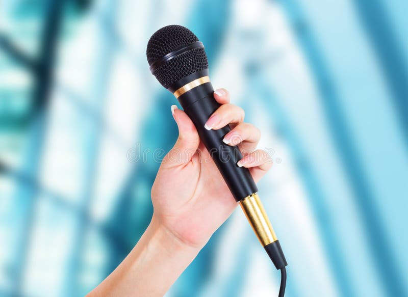 Female Hand with Microphone Stock Image - Image of female, closeup ...