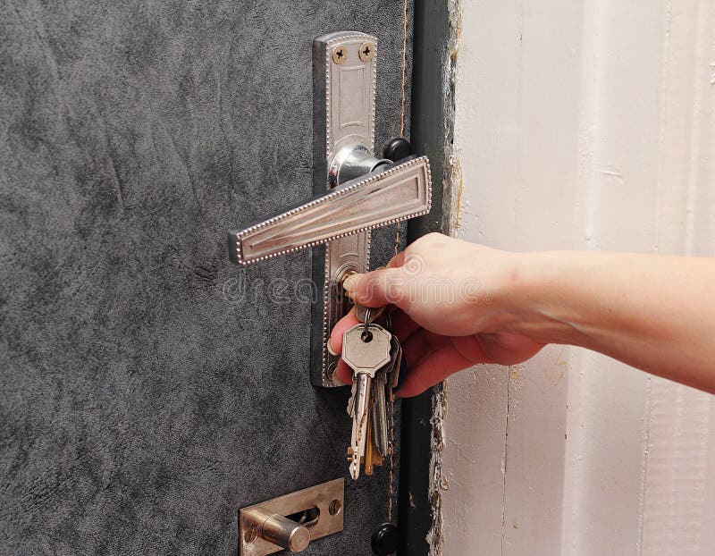 Female Hand Opens the Door with a Key. Stock Photo - Image of owner ...