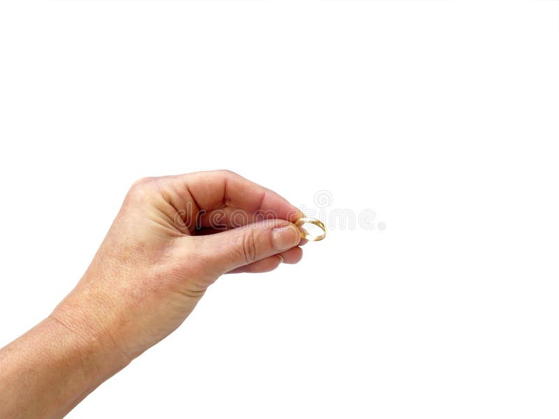 Female Hand Presenting Gold Wedding Ring Isolated on White Stock Photo ...