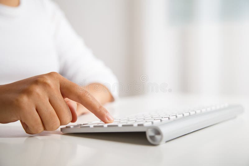 Female Hand Pressing Enter Key on Wireless Keyboard Stock Image - Image ...