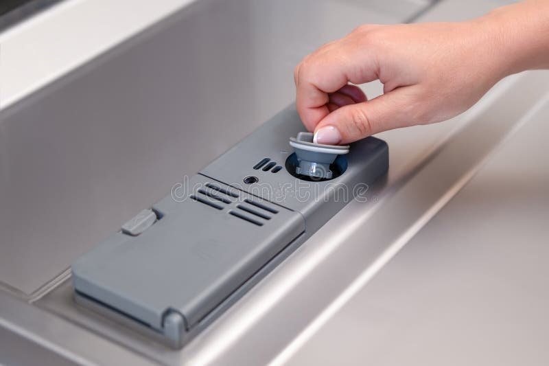 Female Hand Puts Dishwasher Tablet into Open Automatic Built-in ...