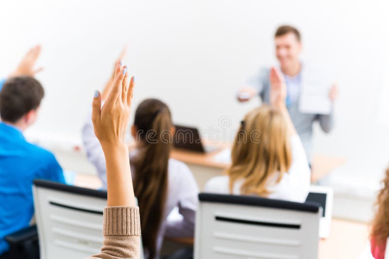 Female Hand Raised in Class Stock Photo - Image of grade, casual: 39086408