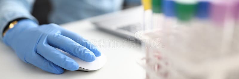 Female Hand in Rubber Glove Holds Computer Mouse in Chemical Laboratory ...