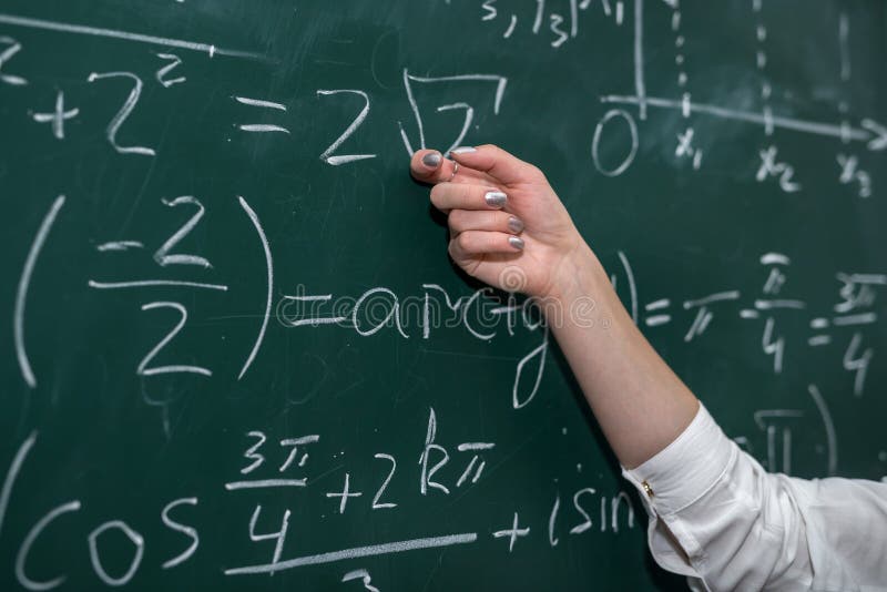 Female Hand Showing Math Formula in Chalkboard. Back To School Stock ...