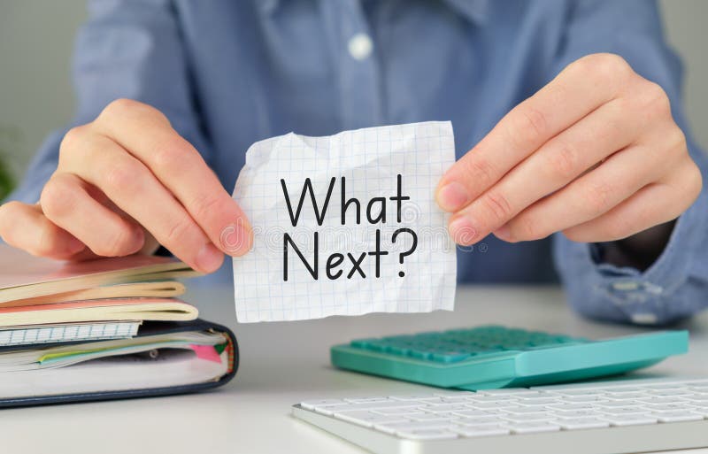 Female Hand Showing What S Next? Text on Paper Notepad Stock Image ...