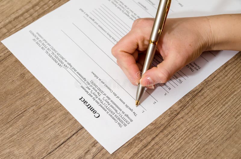 Female Hand Signing a Contract Stock Image - Image of business ...