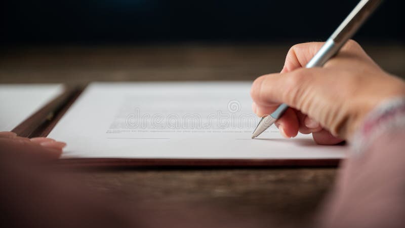 Female Hand Signing a Document Stock Image - Image of important ...