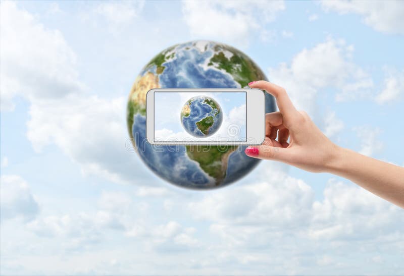 Female Hand with Smartphone Taking Photograph of Earth Stock Photo ...