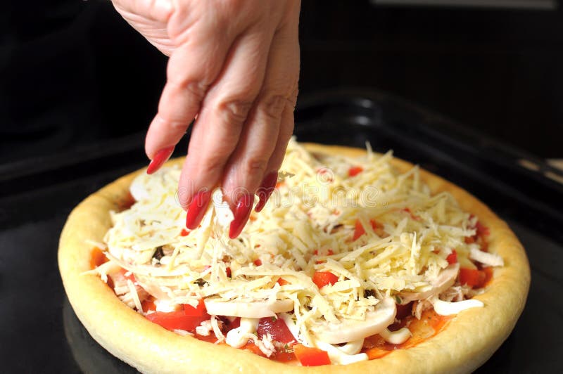 Hand Sprinkle Grated Cheese On Pizza Stock Image - Image of closeup ...
