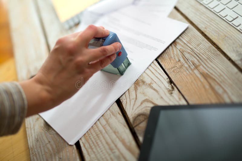 Female Hand Stamping Document Stock Image - Image of agent, female ...